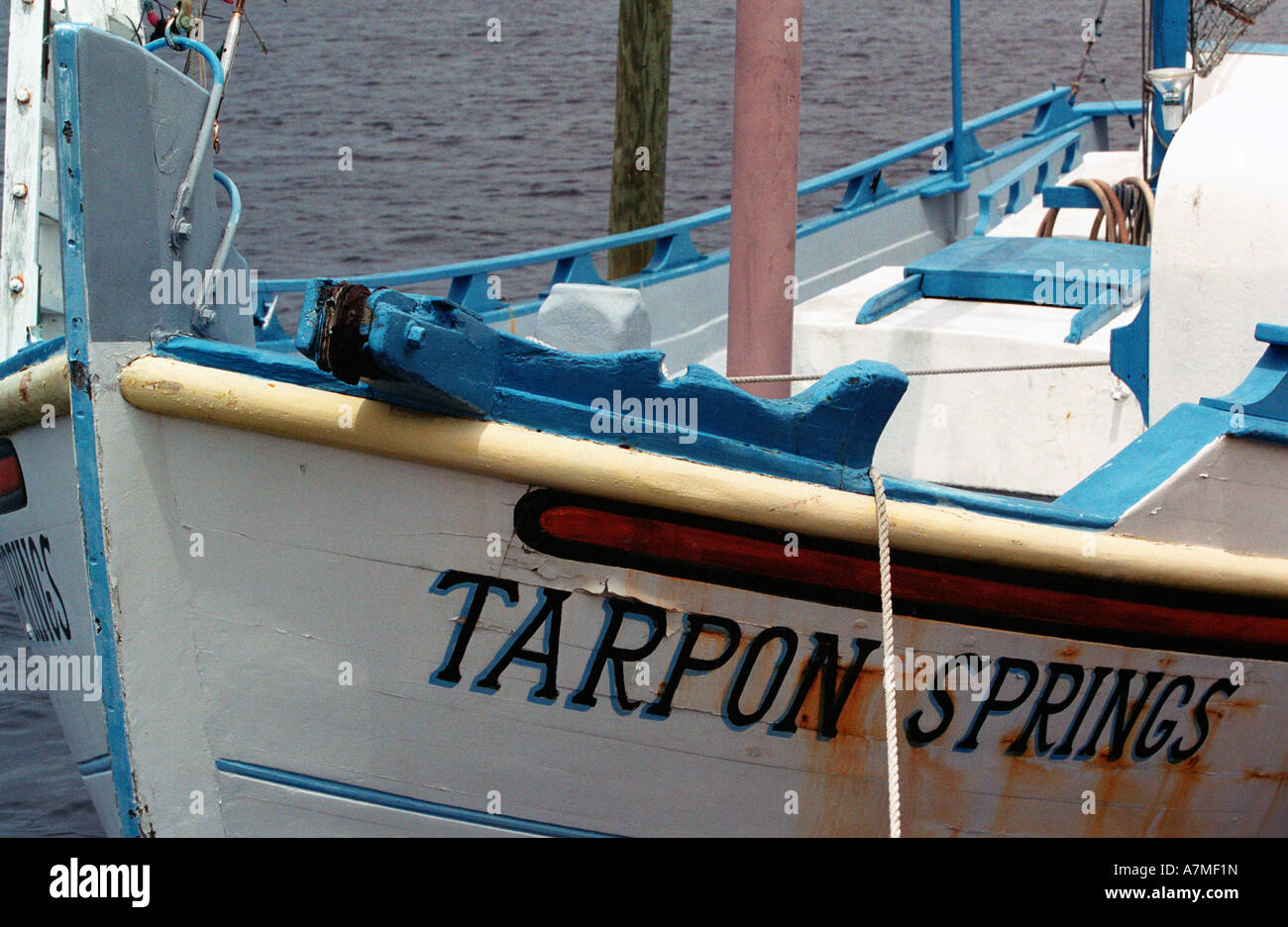 Traditional Greek sponge diving boat moored at the Greek Sponge Docks ...