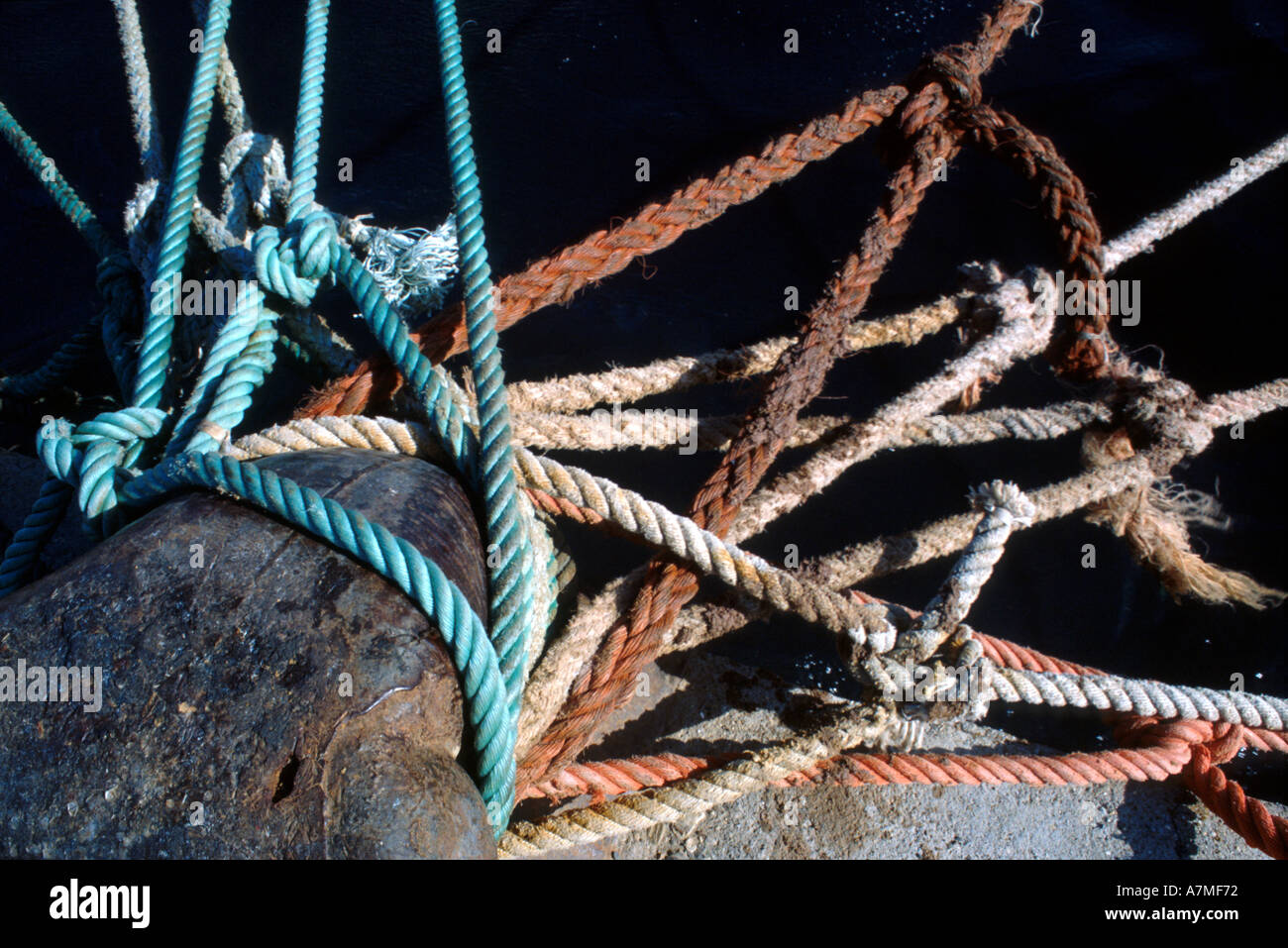 mooring ropes at harbour Stock Photo - Alamy
