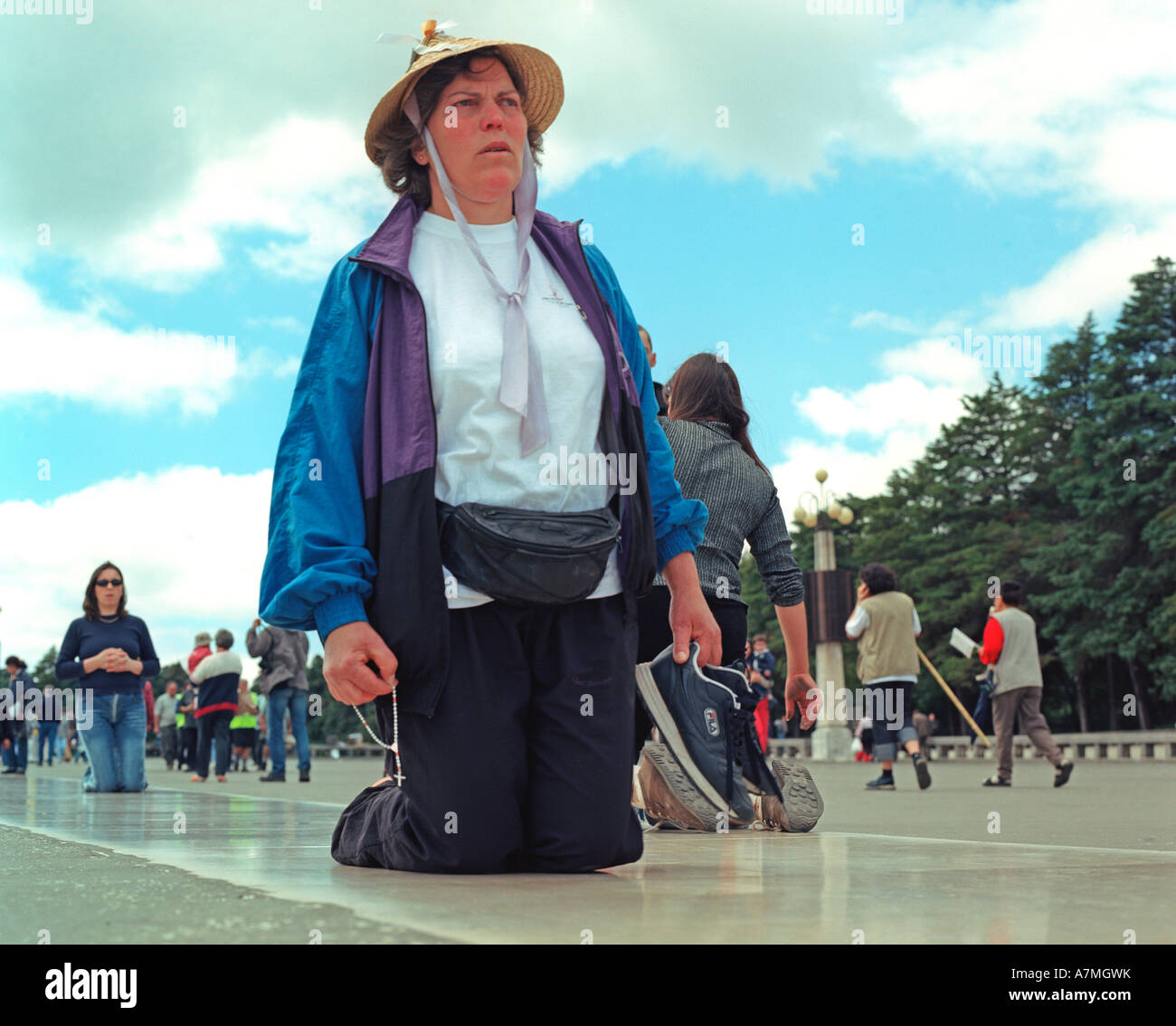 Catholic faithful crawl on hands and knees in pilgrimage to the statue ...
