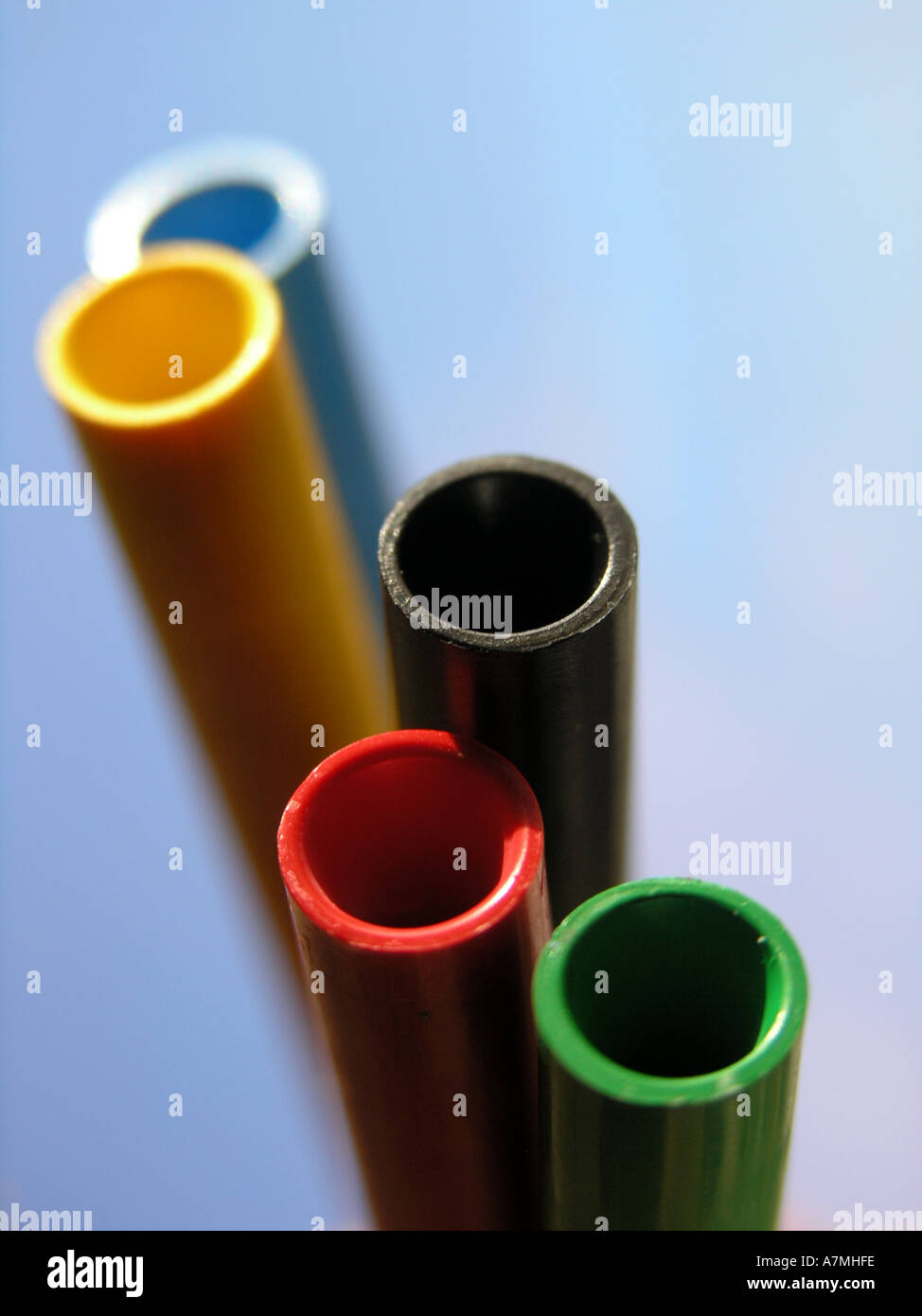 Brightly coloured primary colours plastic tubes Stock Photo - Alamy