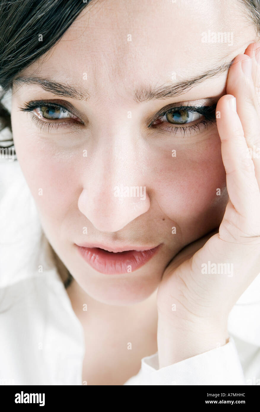 A woman with a tension headache Stock Photo - Alamy