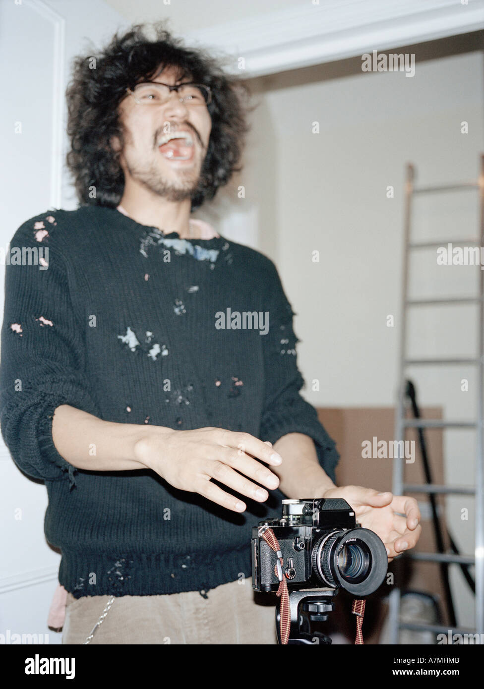 Ladder photographer hi-res stock photography and images - Alamy