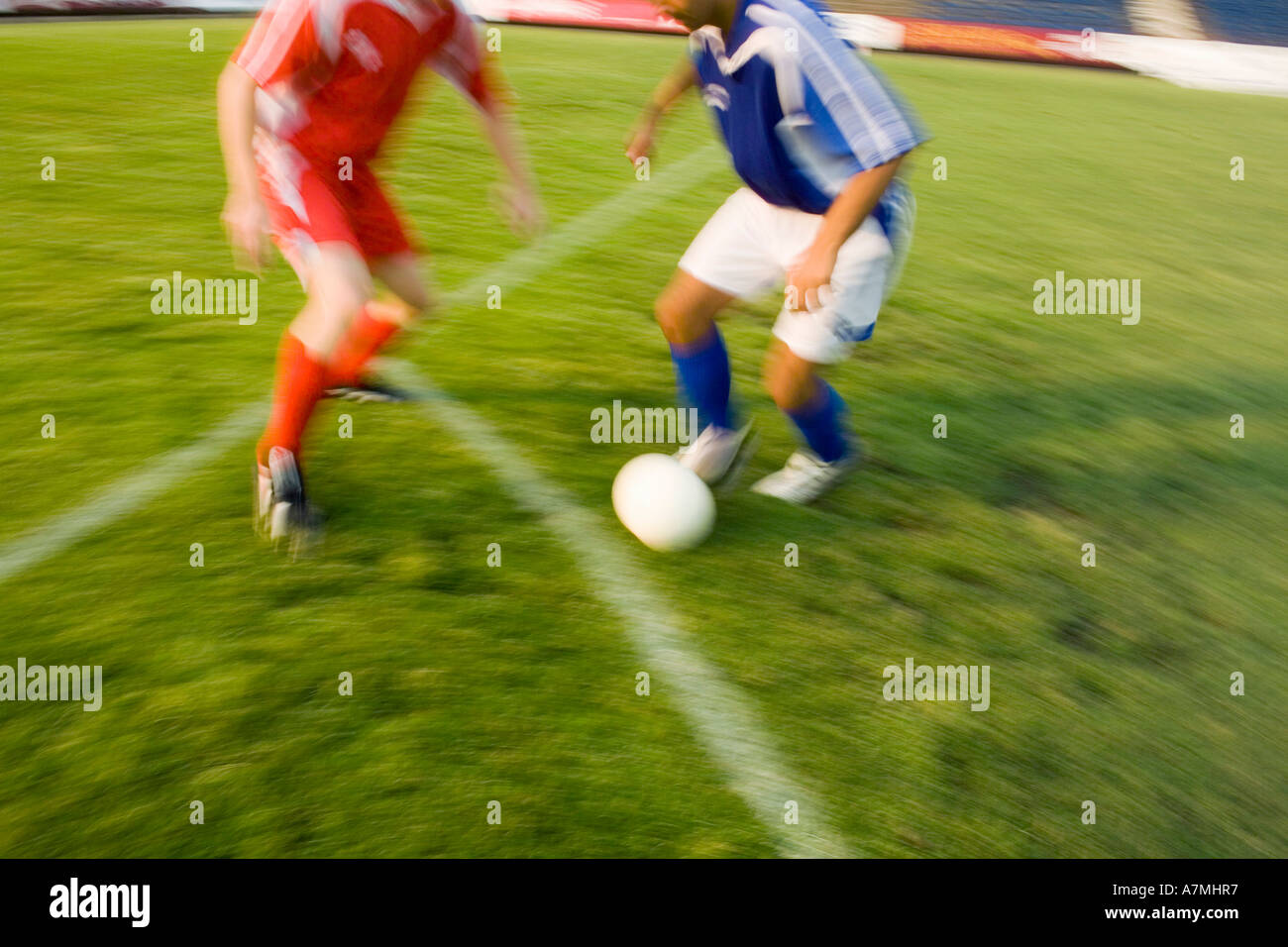 Two soccer players playing soccer Stock Photo - Alamy