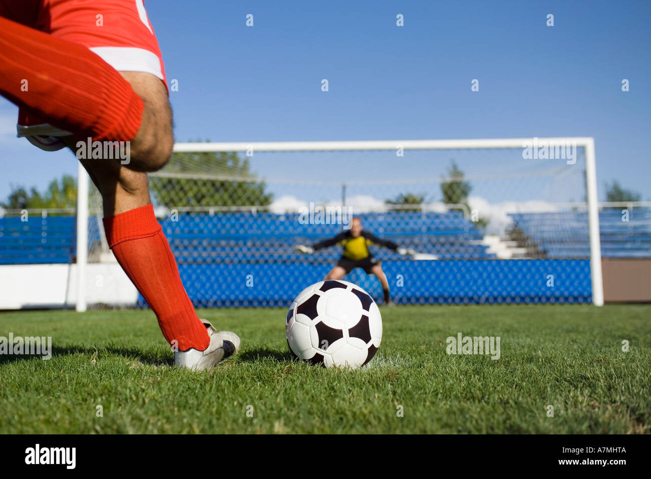 Two soccer players taking a break Stock Photo - Alamy