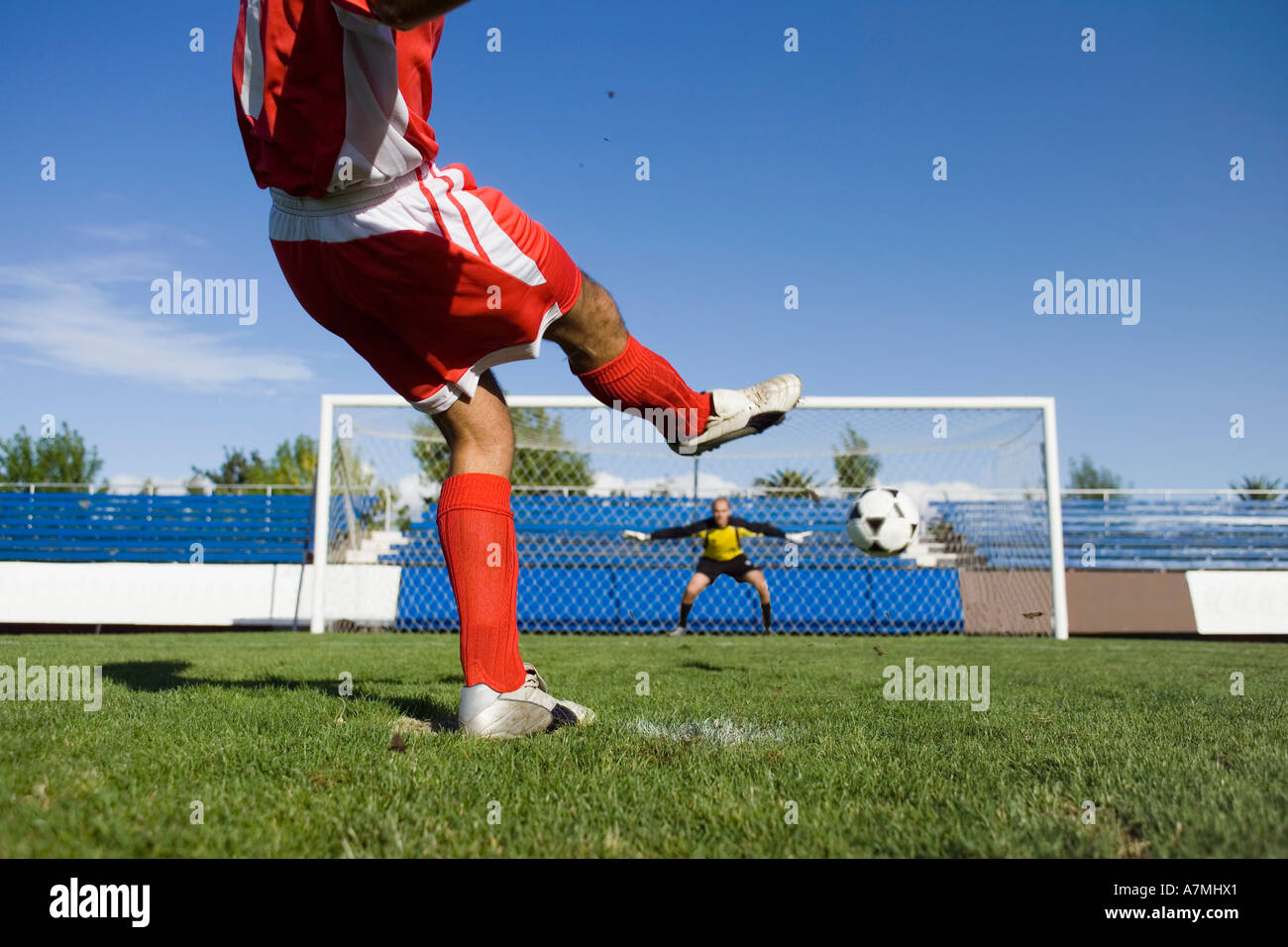 A soccer player taking a penalty shot Stock Photo - Alamy