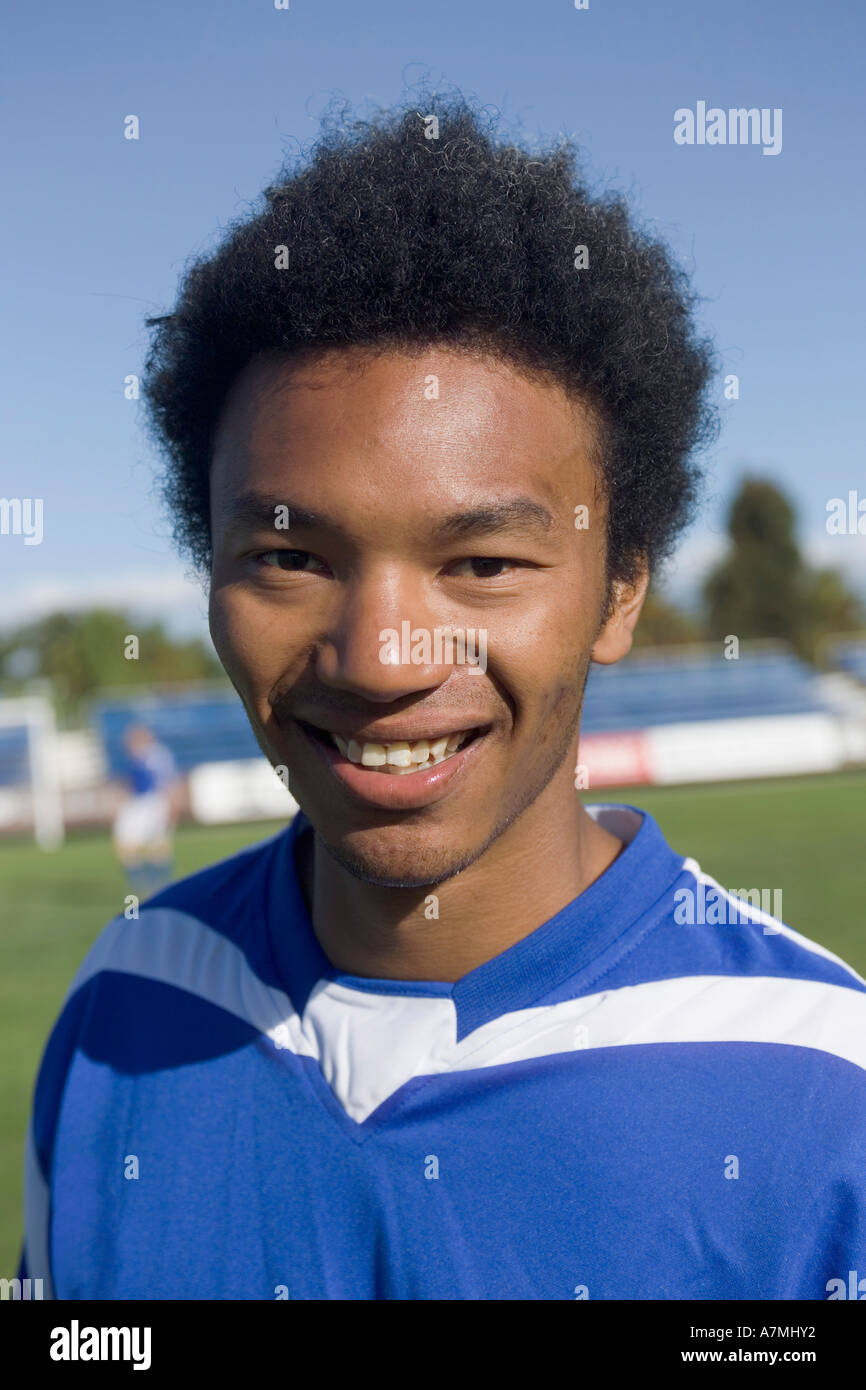 A portrait of a soccer player smiling Stock Photo - Alamy
