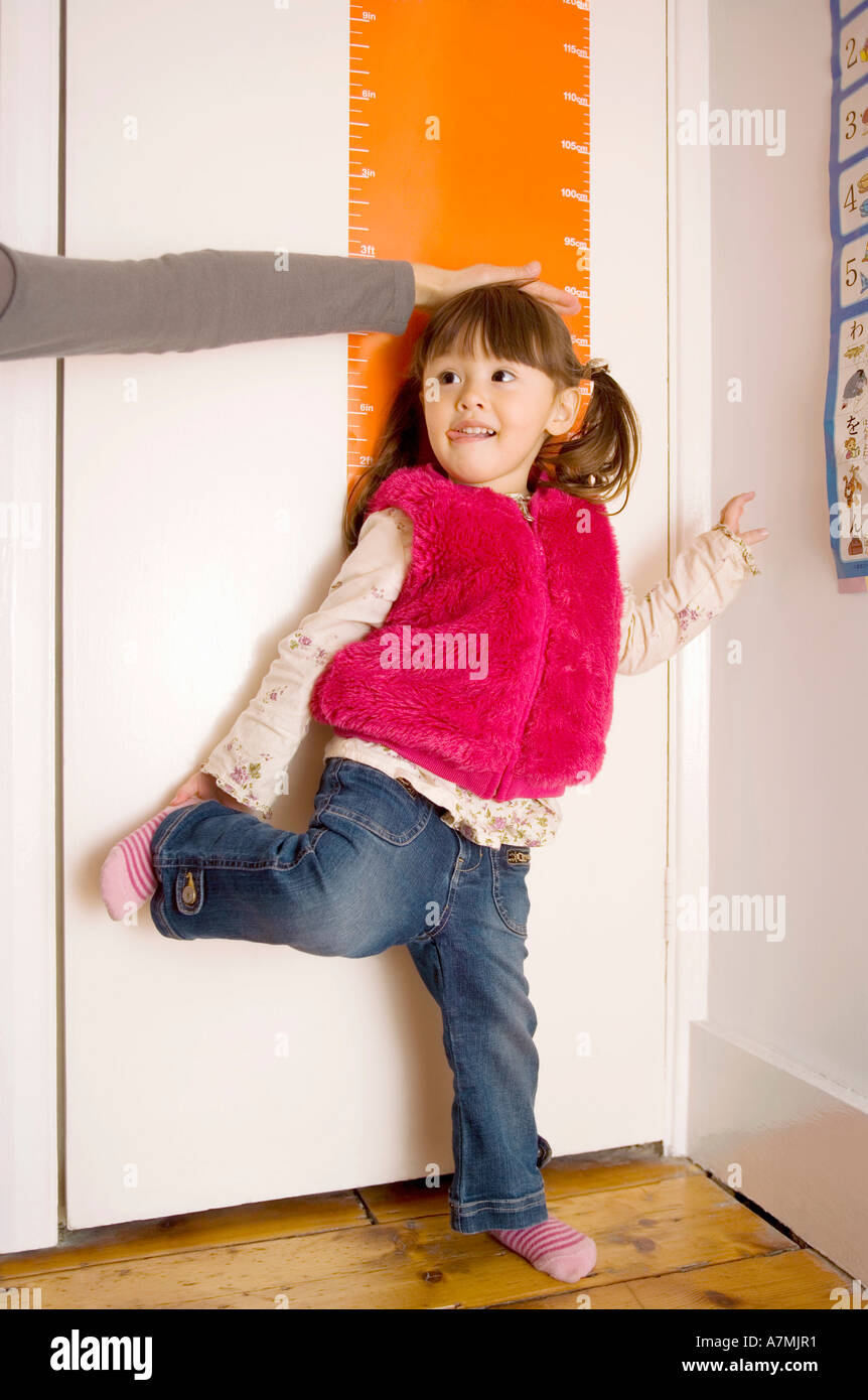 Height measured child hi-res stock photography and images - Alamy