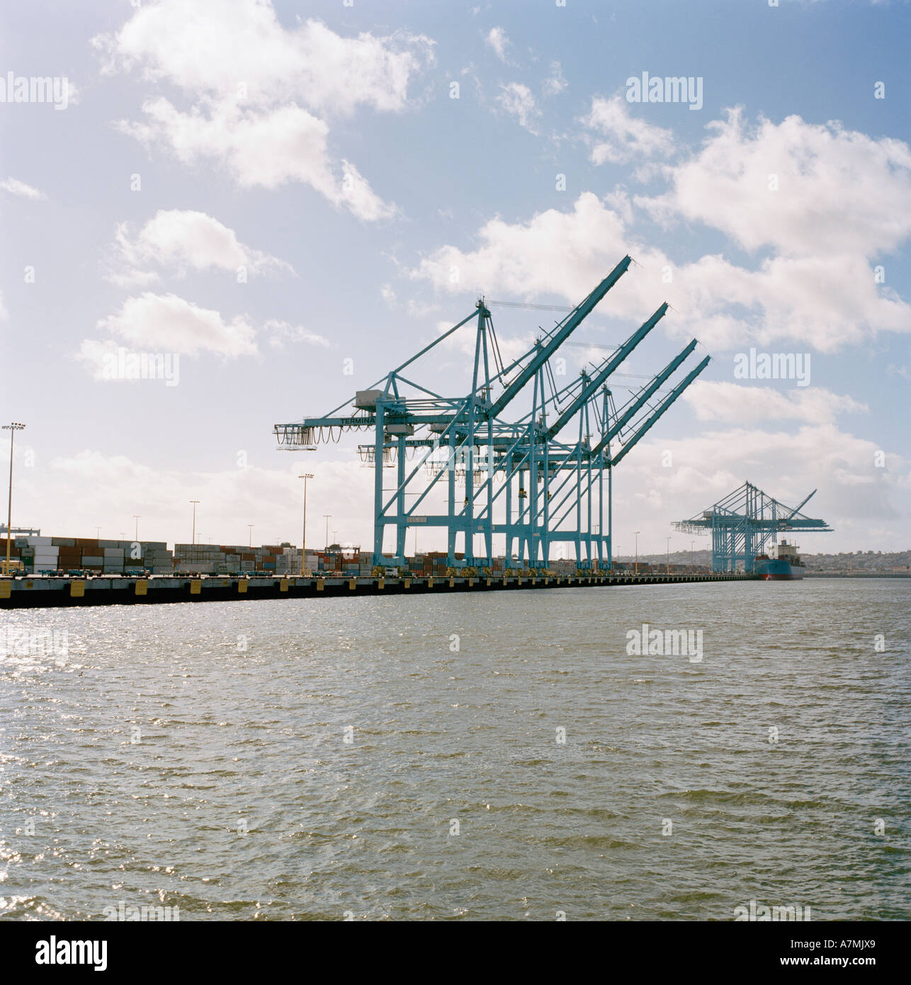 Heavy cranes on commercial dock Stock Photo - Alamy