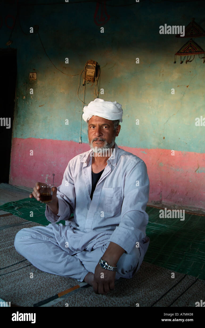 Egyptian man drinking tea, Siwa, Egypt Stock Photo - Alamy