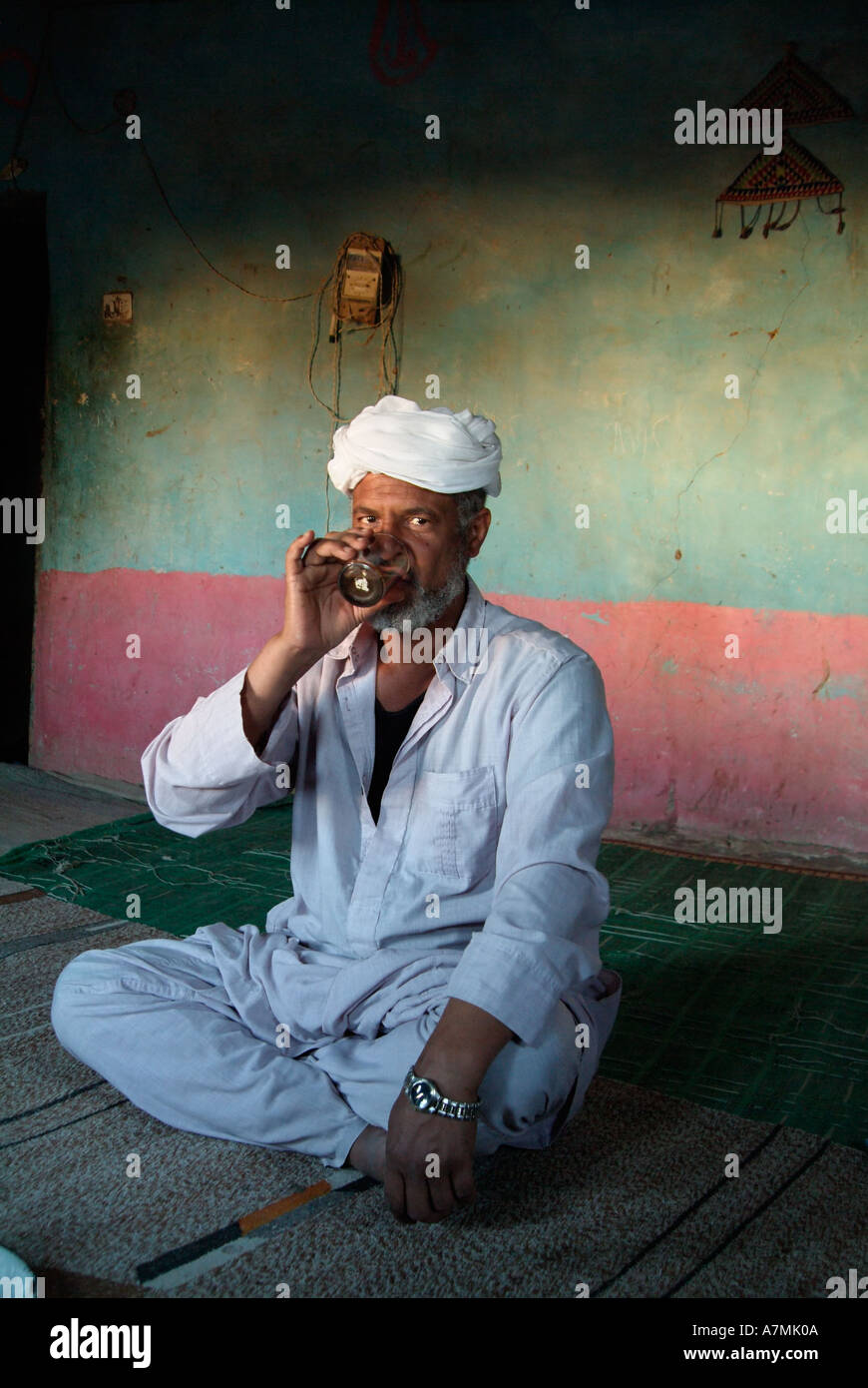 Egyptian man drinking tea, Siwa, Egypt Stock Photo - Alamy
