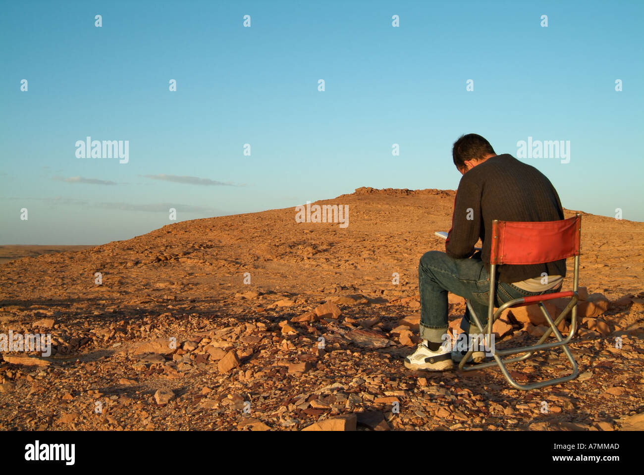 Tourist writing his diary, bush camp in the Sahara Desert, Libya Stock ...