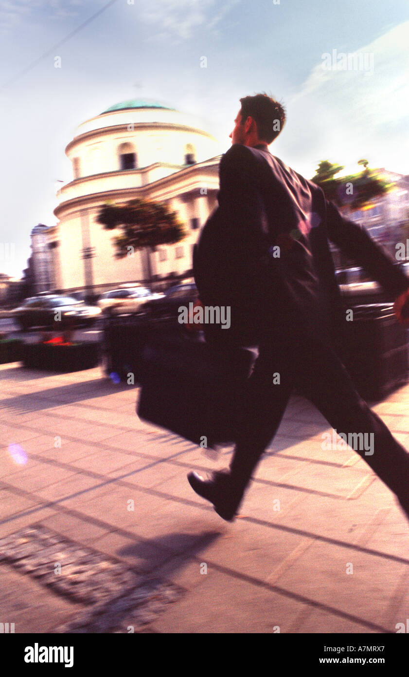 Man running town hurry hi-res stock photography and images - Alamy