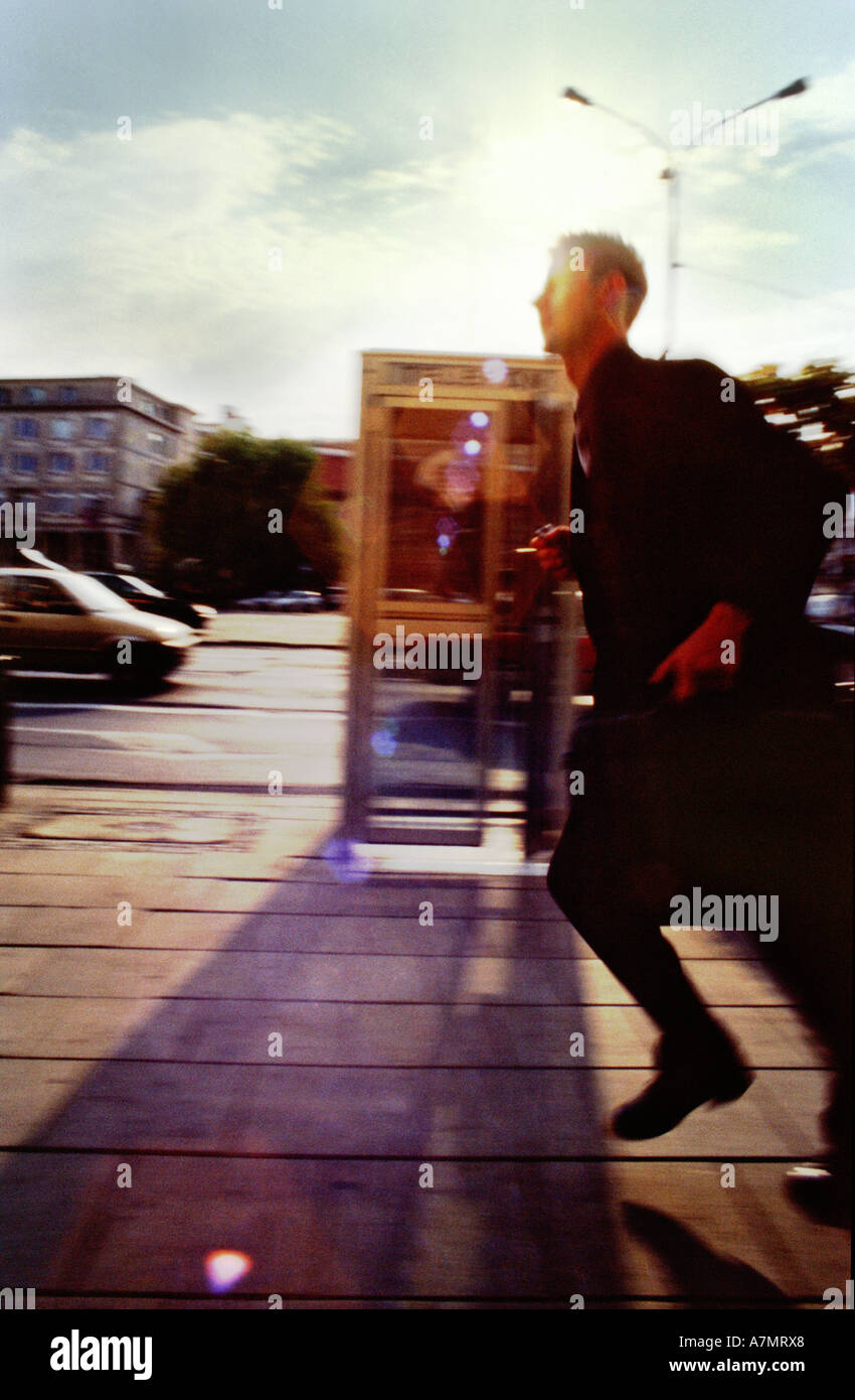 Man running town hurry hi-res stock photography and images - Alamy