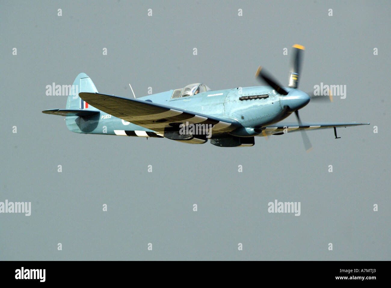 Historic flypast by a Second World War Spitfire aeroplane Stock Photo ...