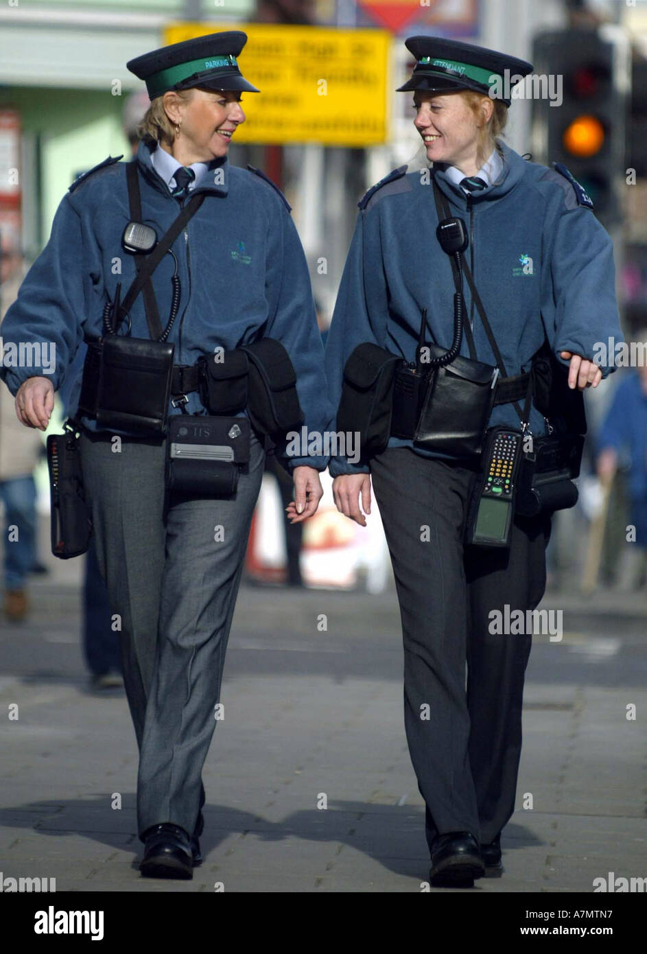 Warden uniform walk parking car hi-res stock photography and images - Alamy