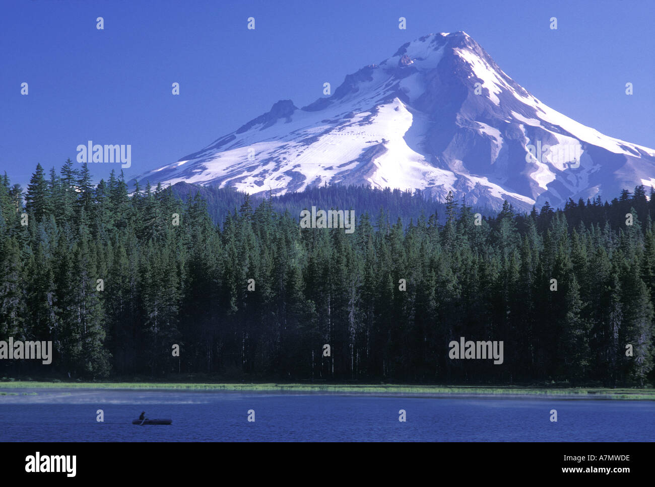 Rowing raft on Frog Lake with Mt. Hood in background, Oregon Stock ...