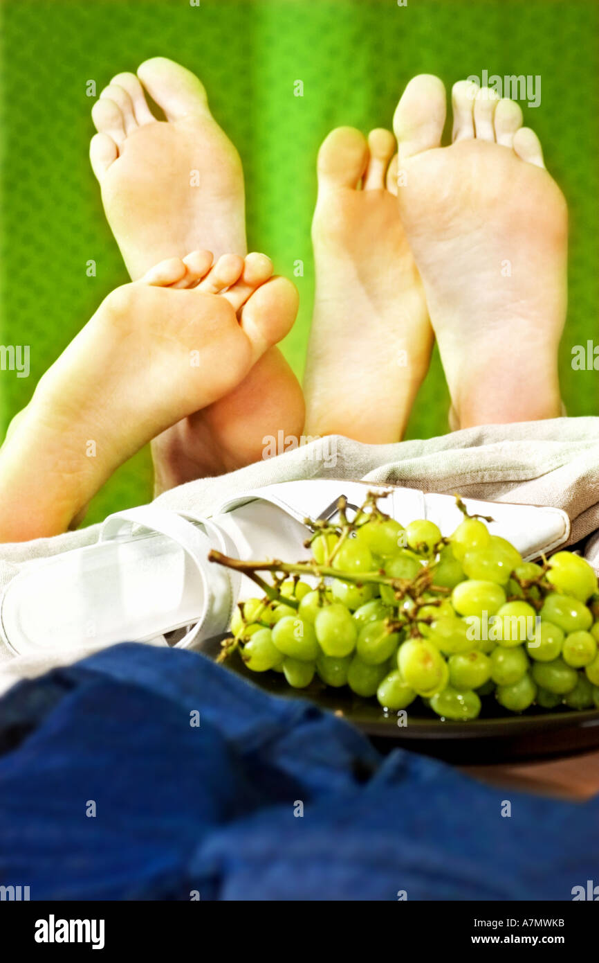 Two people's feet Stock Photo - Alamy