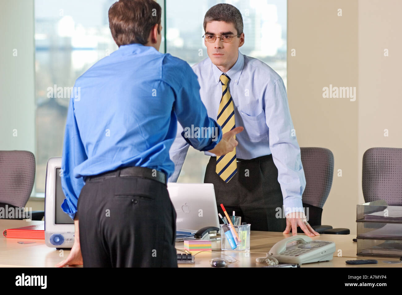 Two men in the office Stock Photo - Alamy