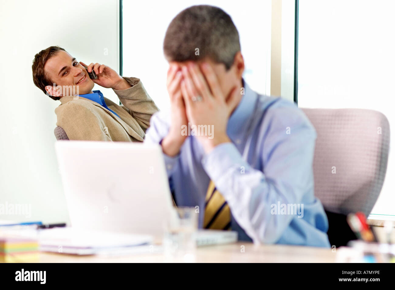 Two men in the office Stock Photo - Alamy