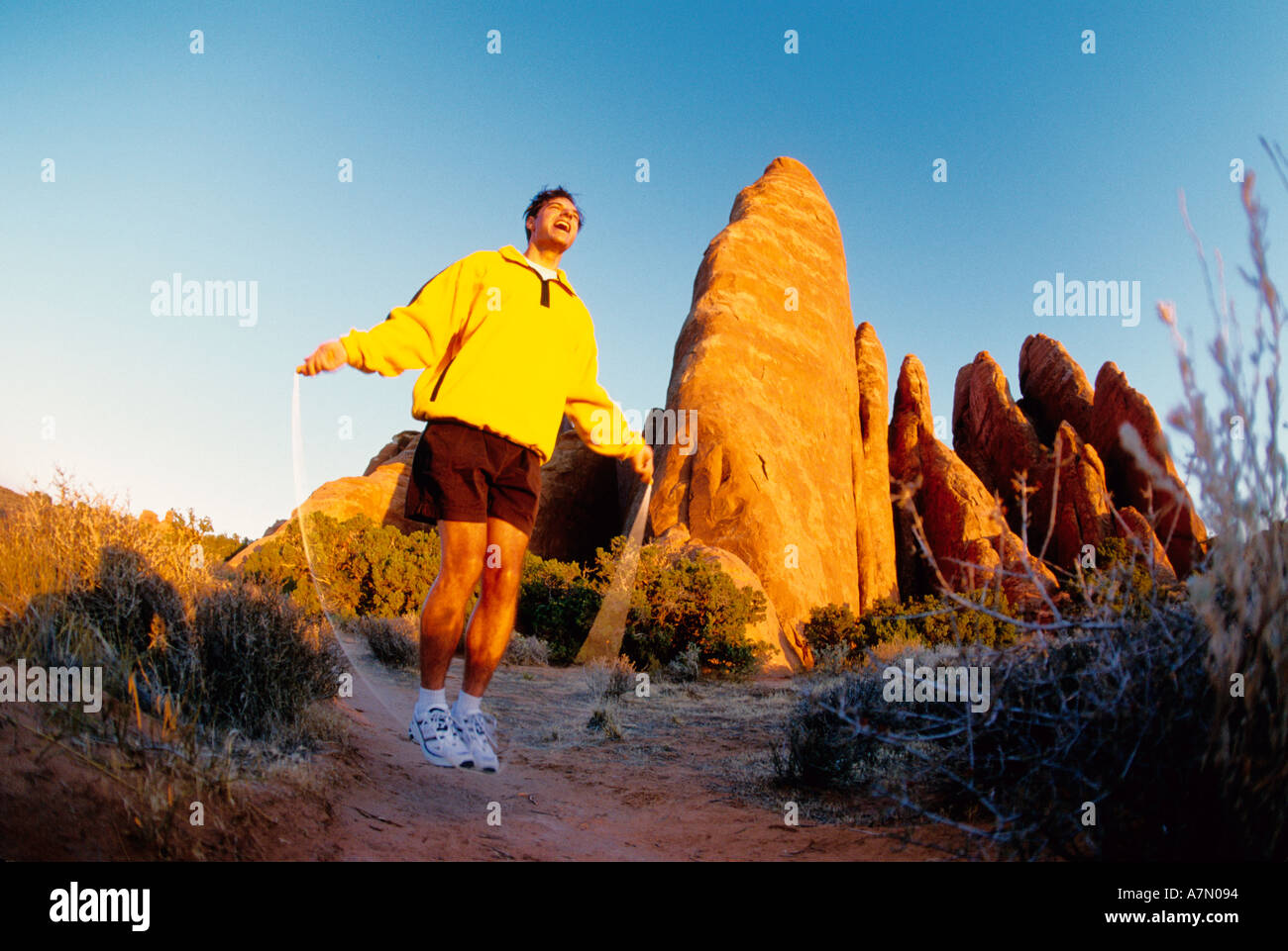 a man jumping rope Stock Photo - Alamy
