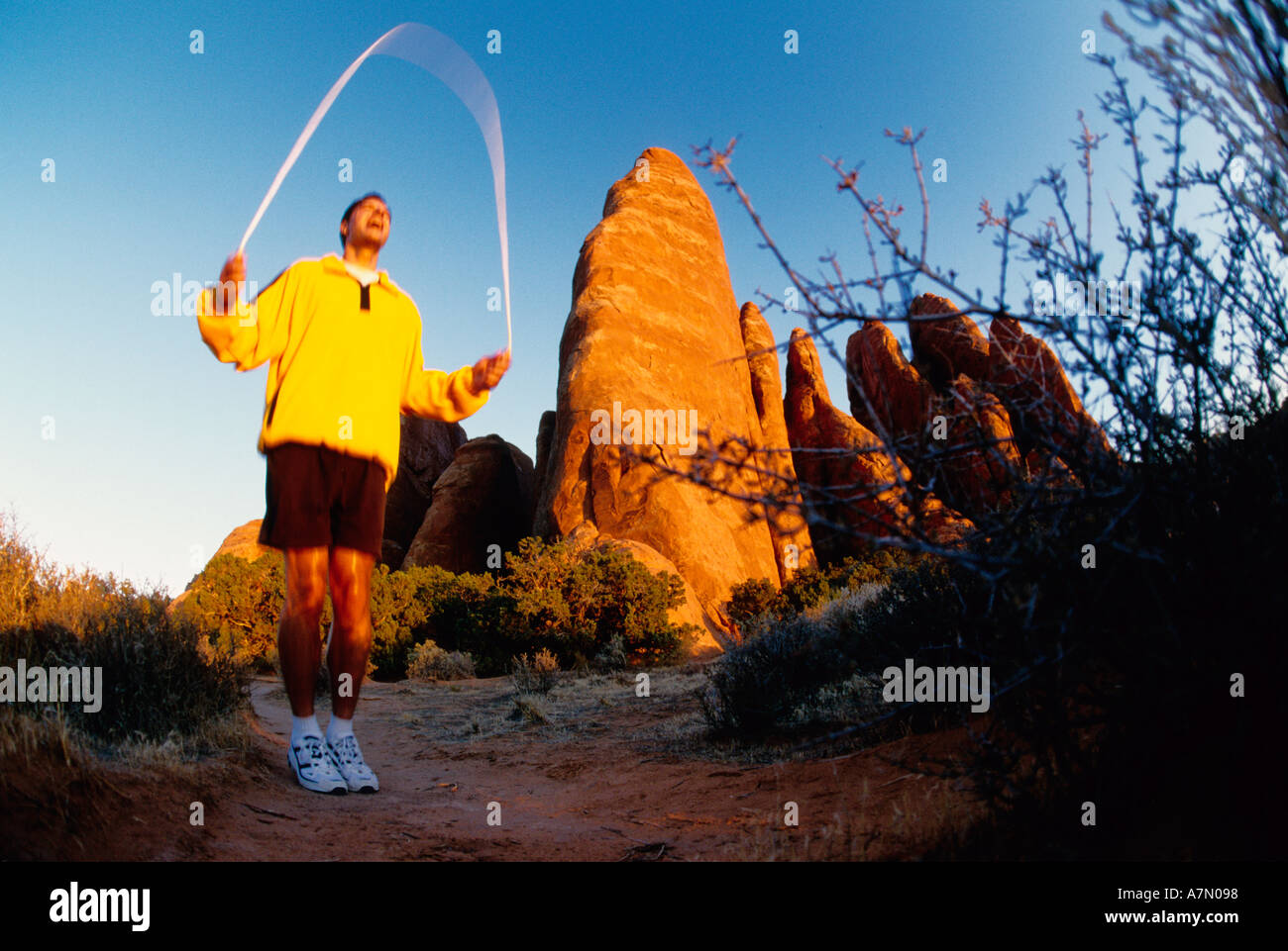 a man jumping rope Stock Photo - Alamy