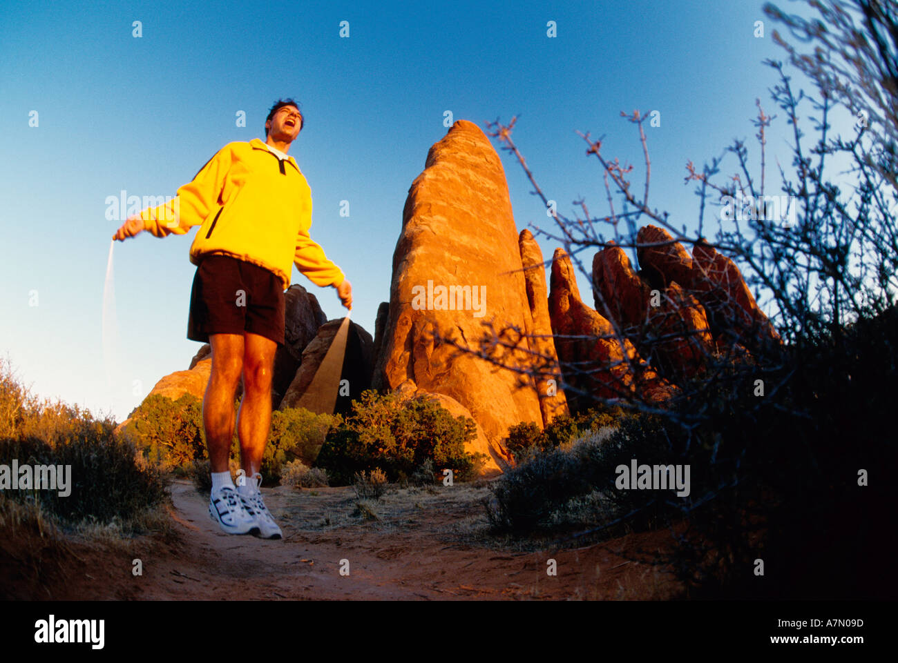 a man jumping rope Stock Photo - Alamy