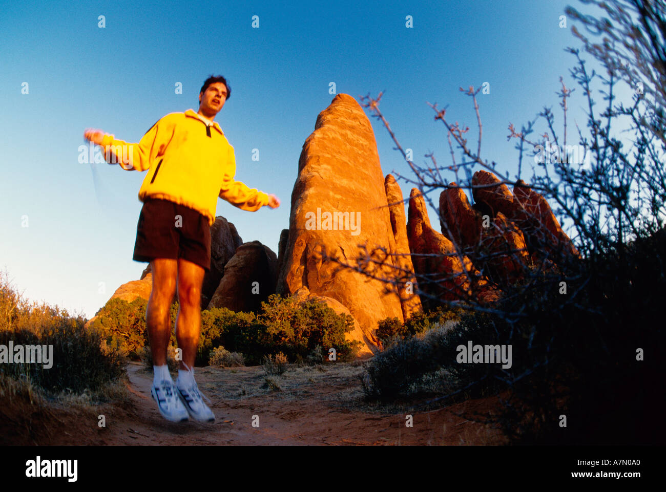a man jumping rope Stock Photo - Alamy