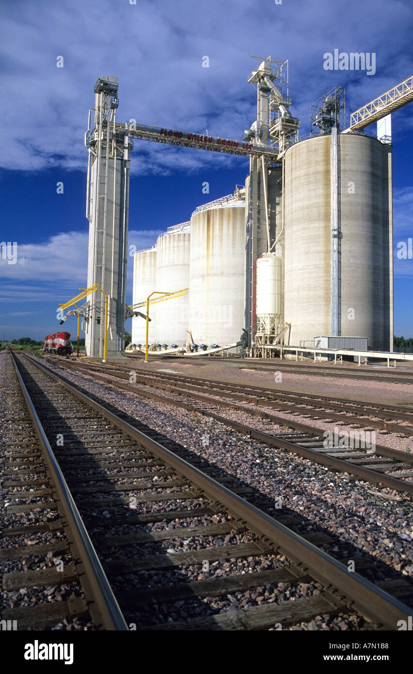 Grain elevators with a train and railroad tracks in Hinton Iowa Stock ...