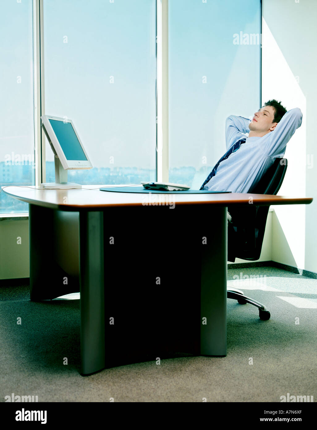 indoor business work office room man young boy 20 25 dark hair shirt ...