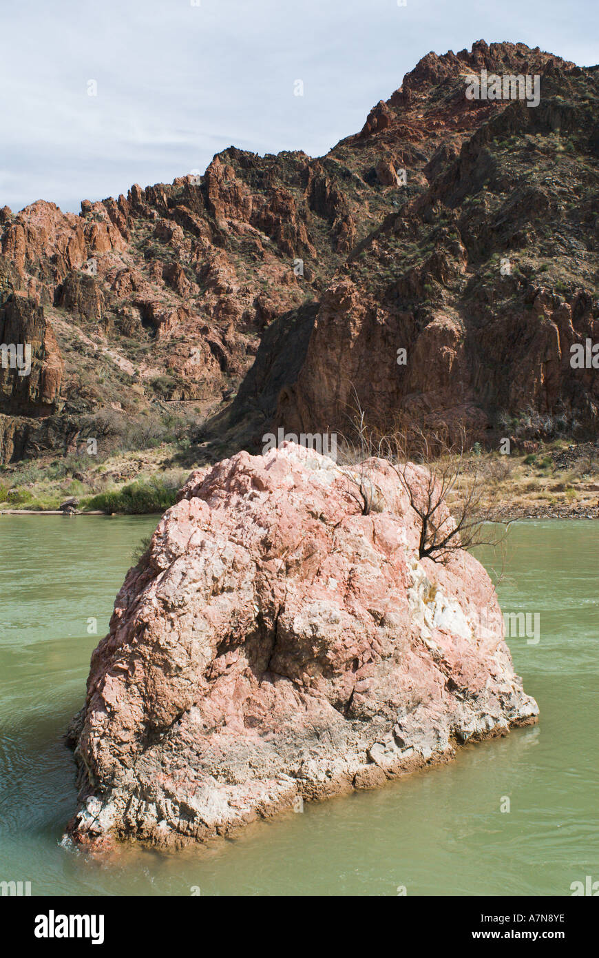 Pink granite rock outcropping in the Colorado River at the bottom of ...