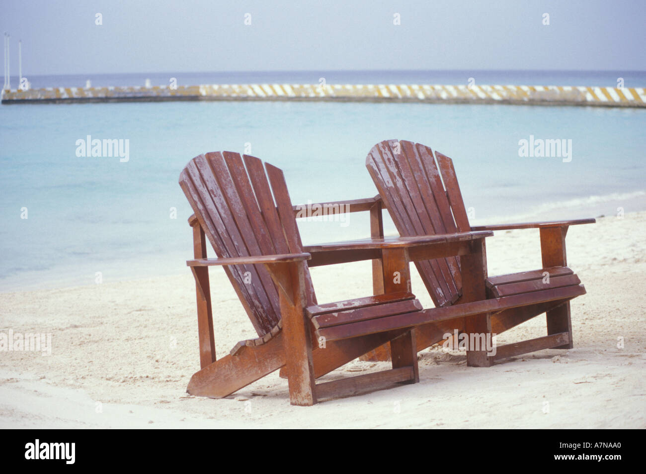 Two adirondack chairs on beach hi-res stock photography and images - Alamy