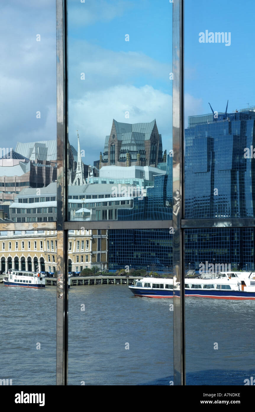River Thames London reflected in glass window of office block Stock ...
