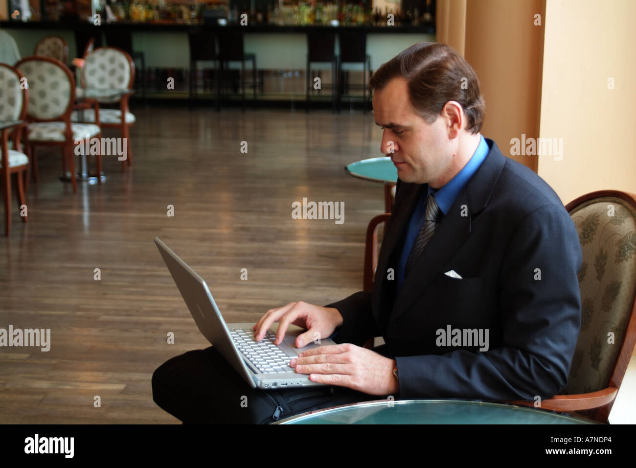 London England United Kingdom UK City gent using laptop computer in ...