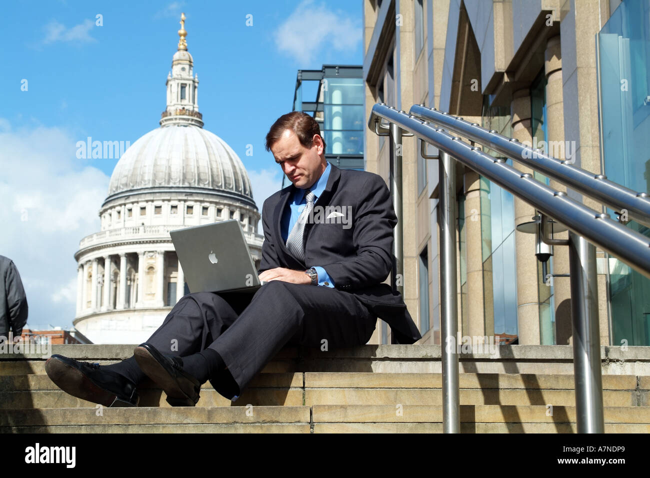 London England United Kingdom UK City gent using laptop computer in ...