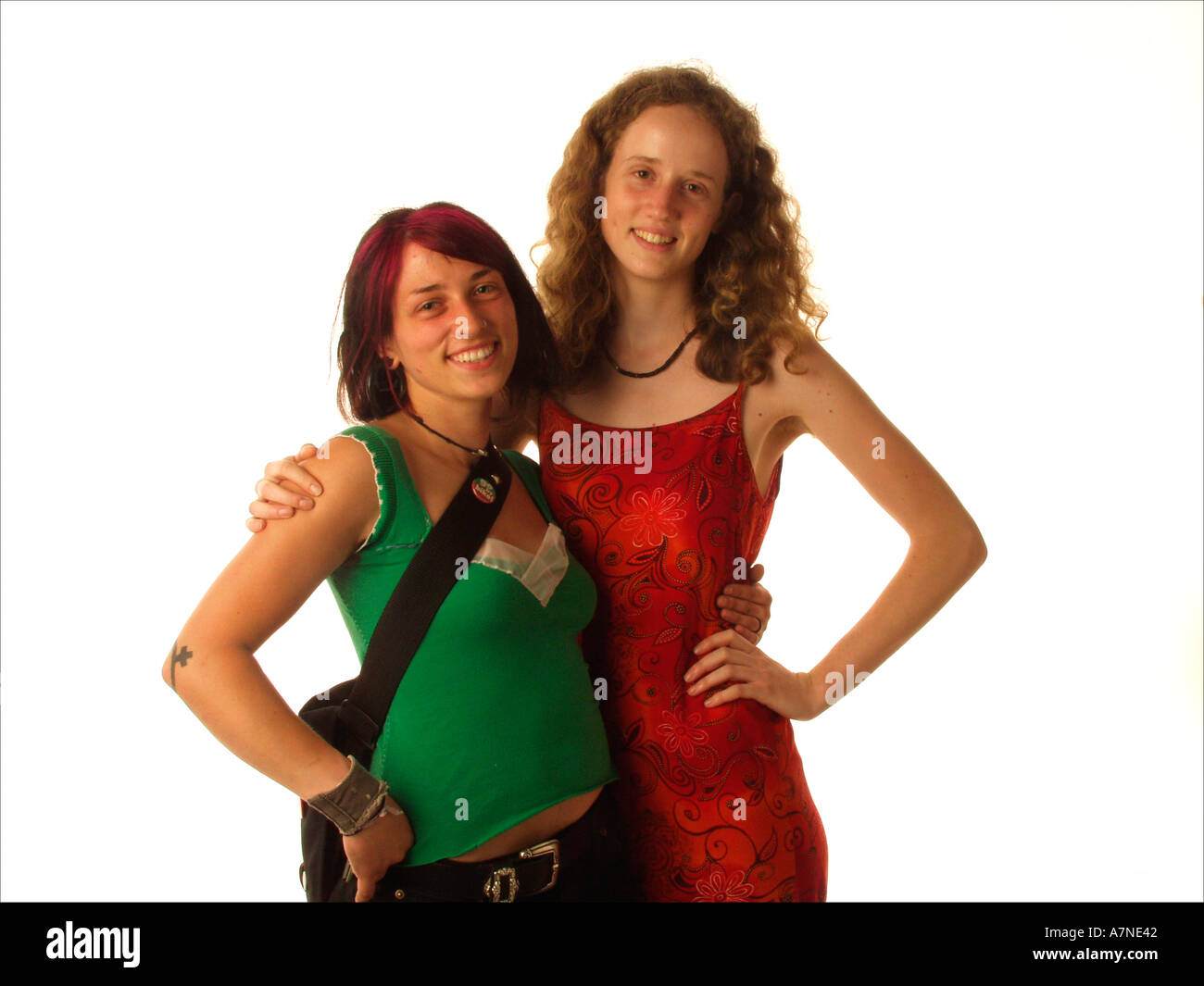 Studio shot of two girls posing together Stock Photo - Alamy