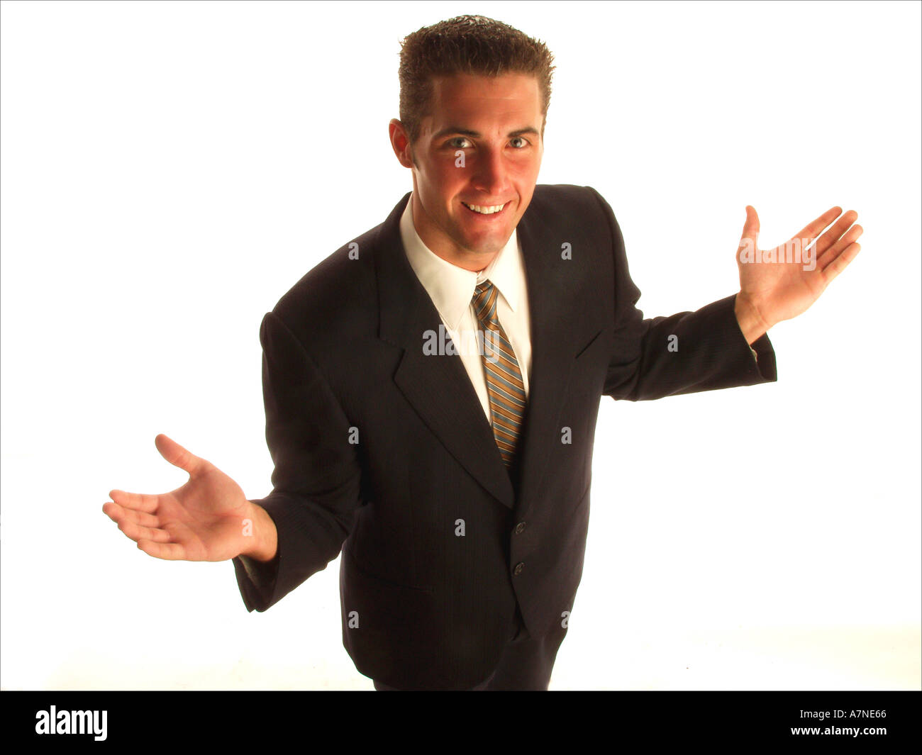 Studio shot of a businessman standing with his arms spread out Stock ...