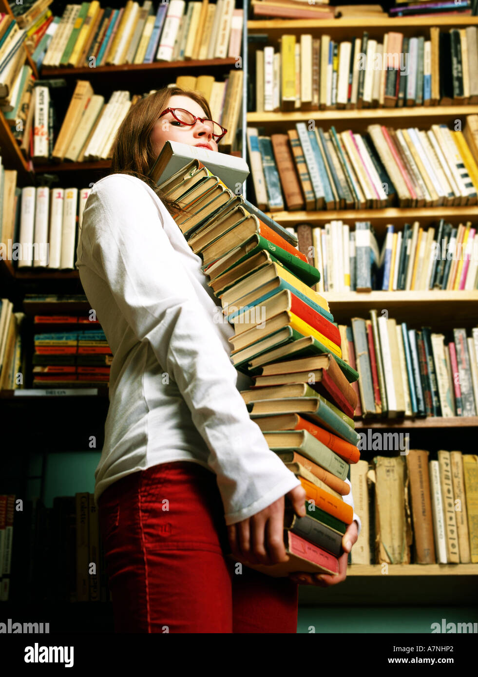 indoor library reading room shelf shelfs ledge ledges books woman young ...