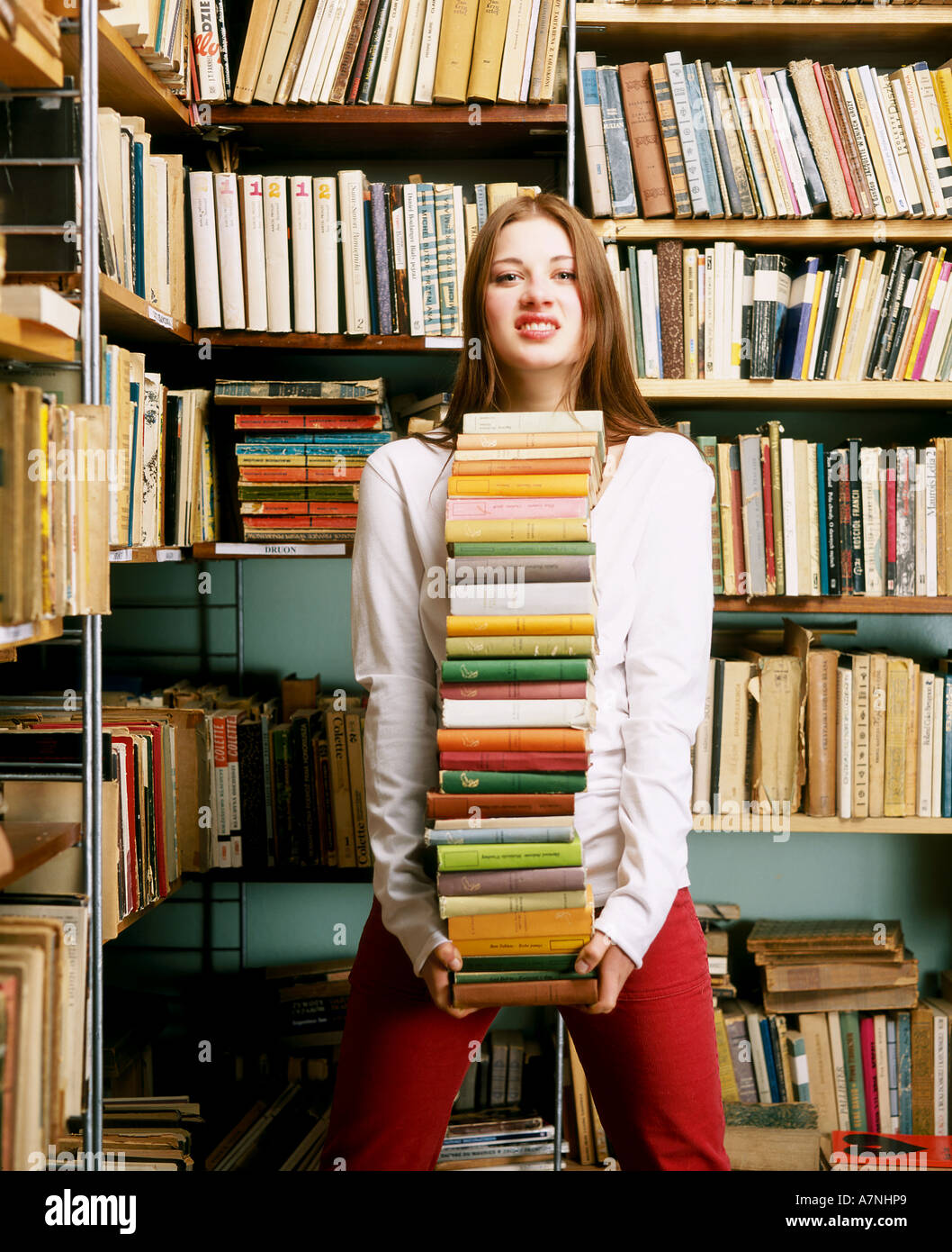 indoor library reading room shelf shelfs ledge ledges books woman young ...