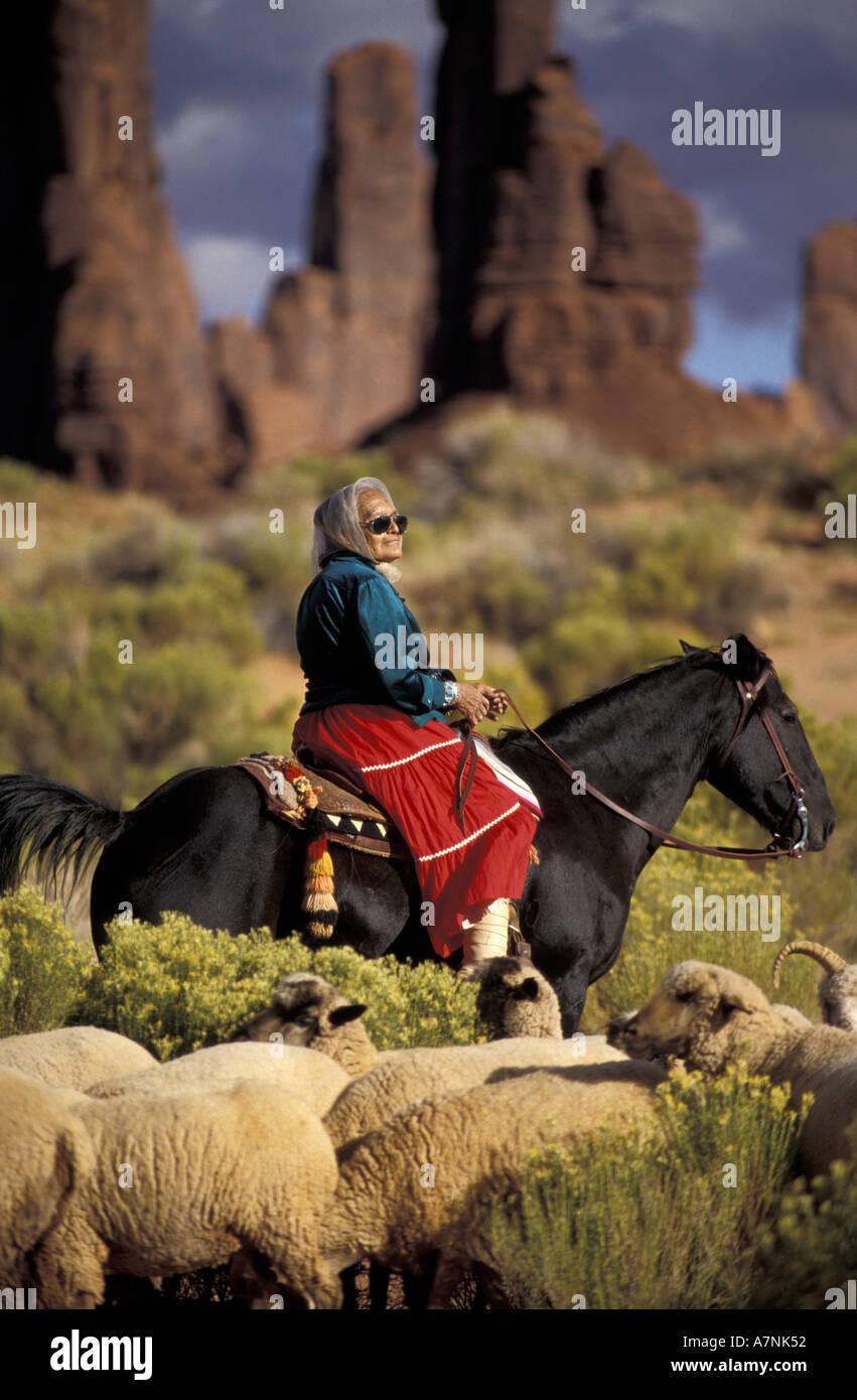 USA, Utah, Monument Valley. Navajo woman herding sheep Stock Photo - Alamy