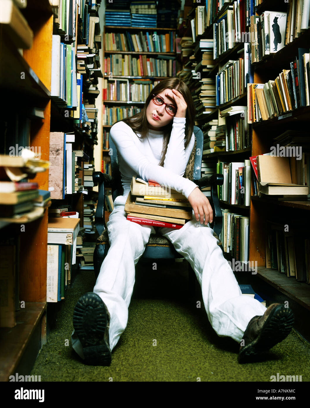 indoor library reading room shelf shelfs ledge ledges books woman young ...