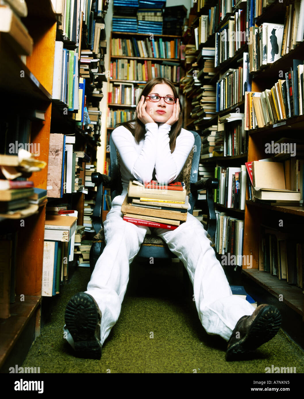 indoor library reading room shelf shelfs ledge ledges books woman young ...