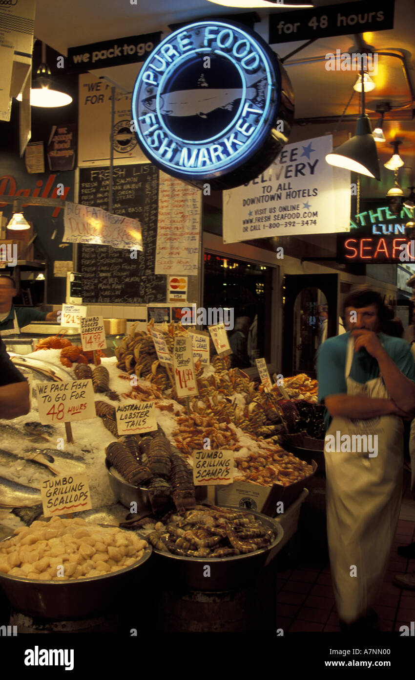 USA, Washington State, Seattle. Fish vendor at the Pike Place Market ...