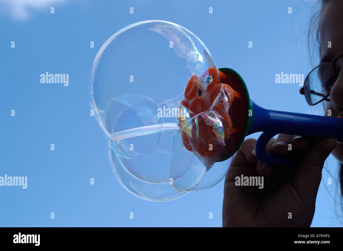 Blowing up balloon girl hi-res stock photography and images - Alamy