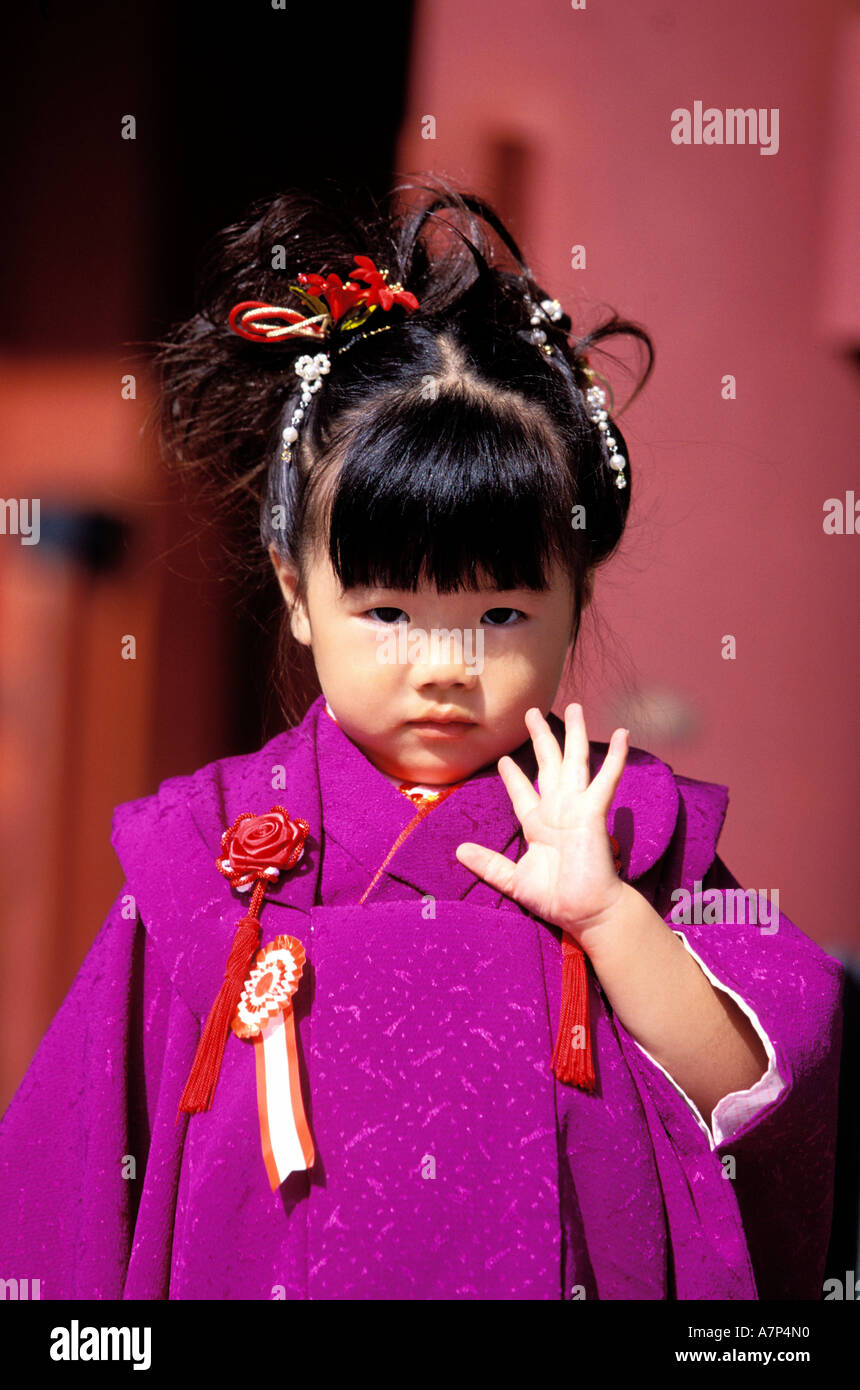 Japan, Honshu Island, Kinki region, Kyoto city, a little girl wearing a ...