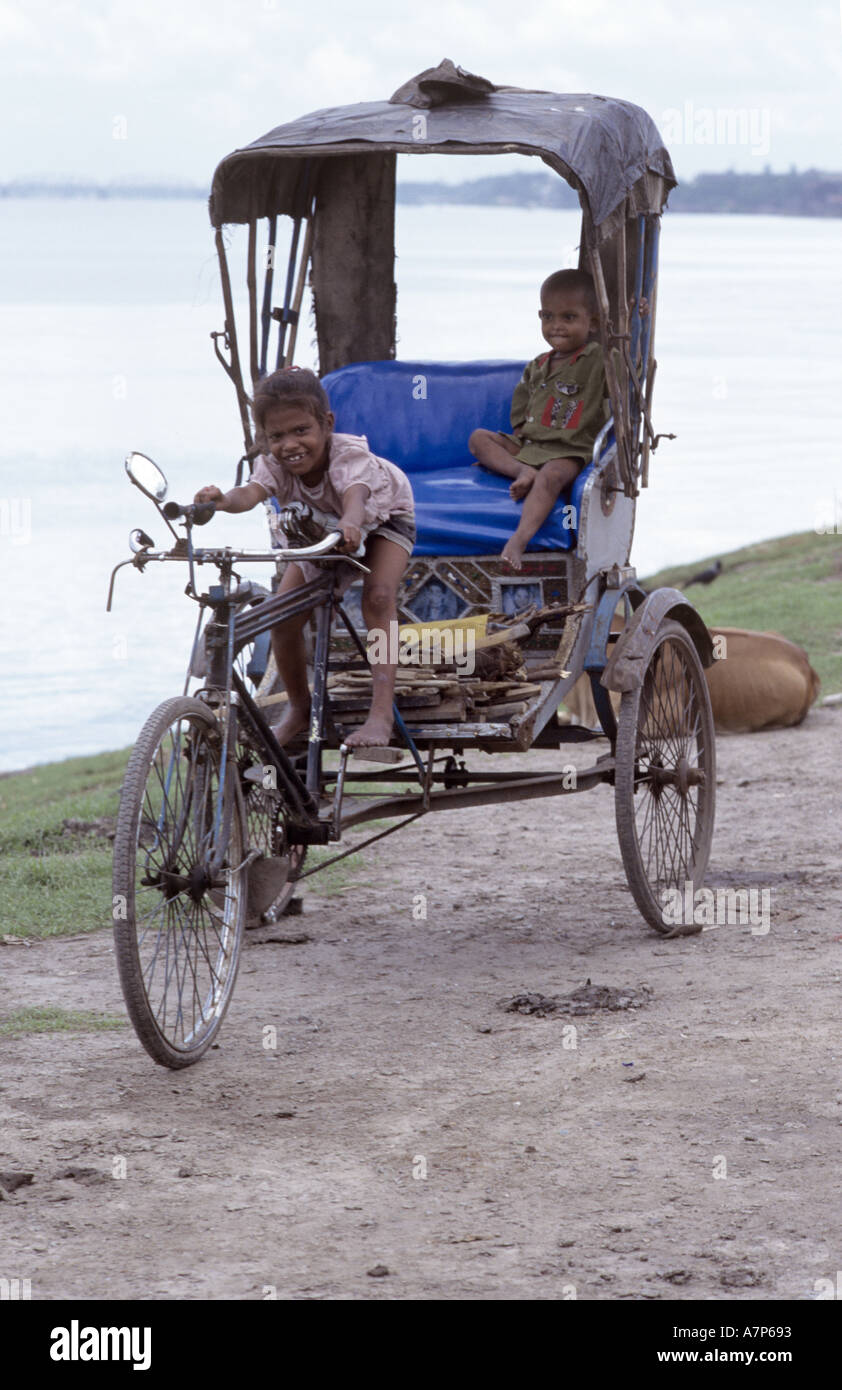 Boy on rickshaw Calcutta Stock Photo - Alamy
