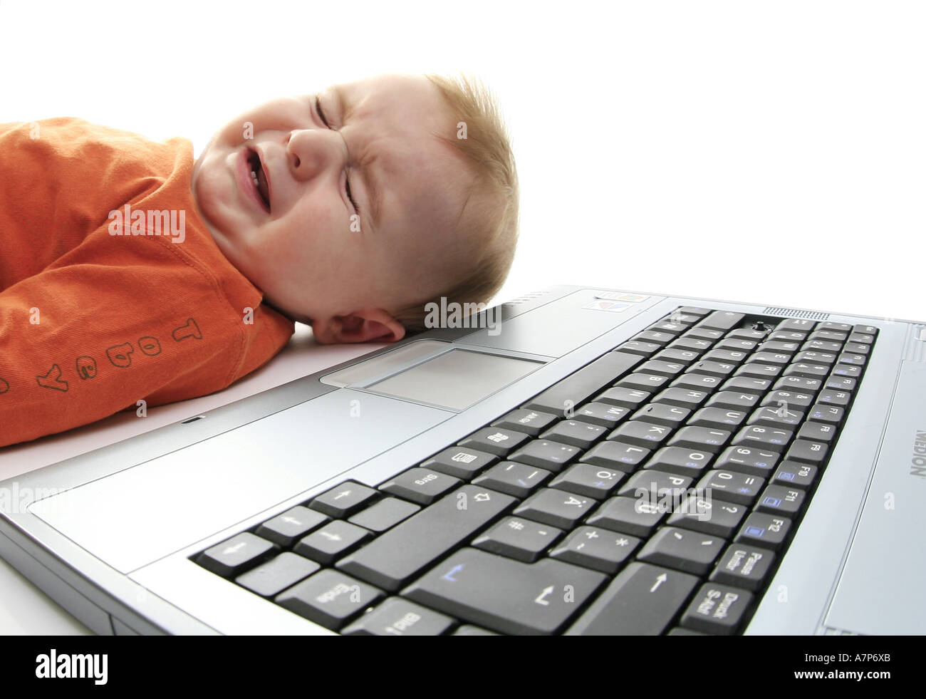 Baby with laptop crying hi-res stock photography and images - Alamy