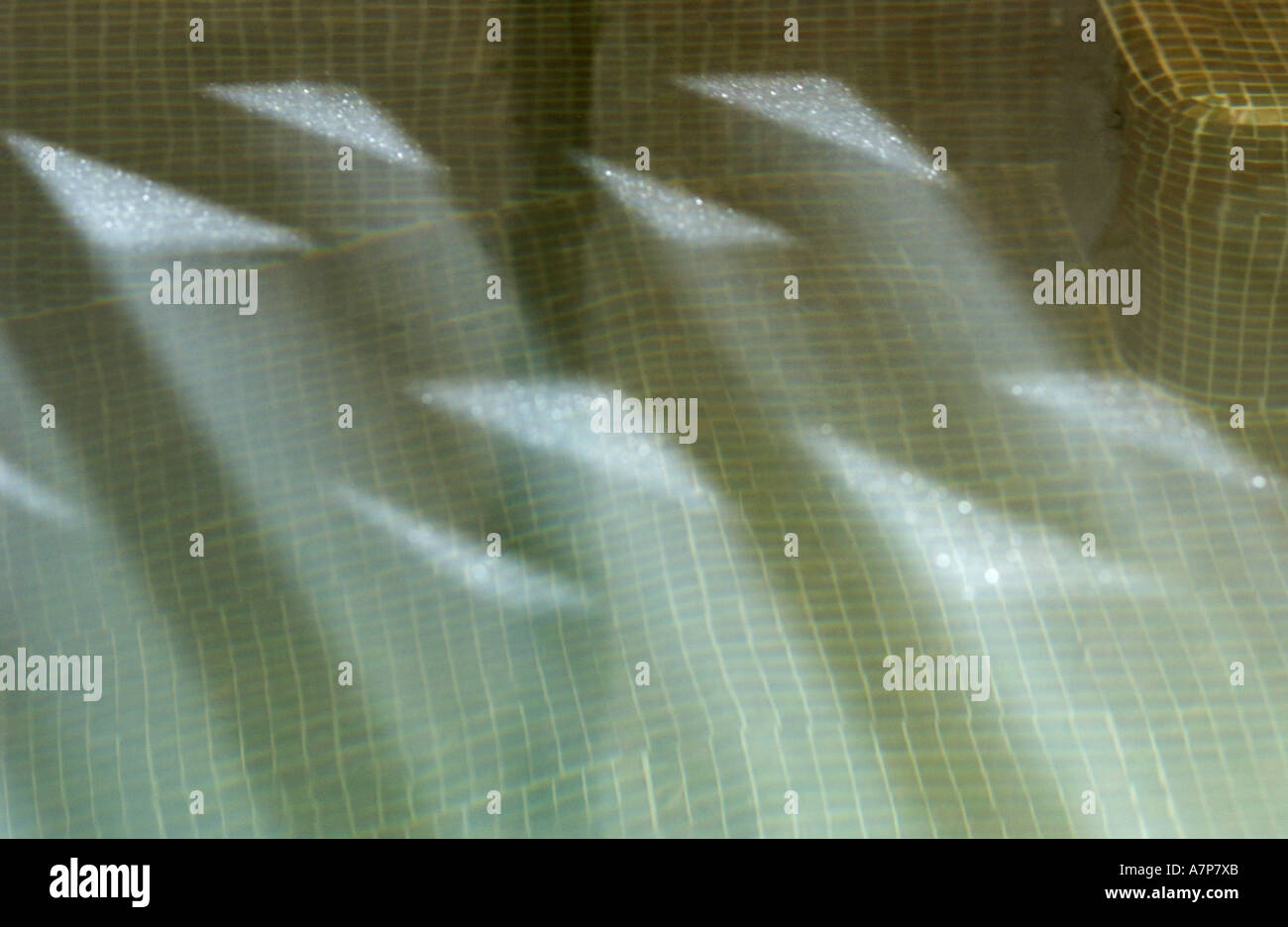 sun plays with water in inside pool Stock Photo - Alamy