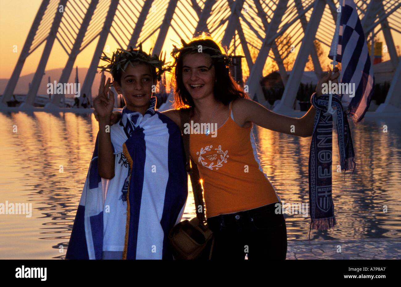 Tourists pose wave hi-res stock photography and images - Alamy