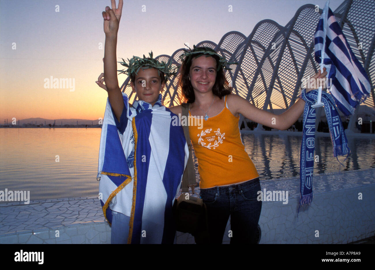 Tourists pose wave hi-res stock photography and images - Alamy