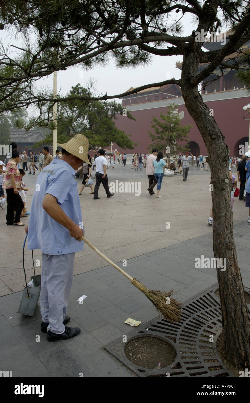 China Beijing Outside The Forbidden City A Municipal Employee Cleaning ...